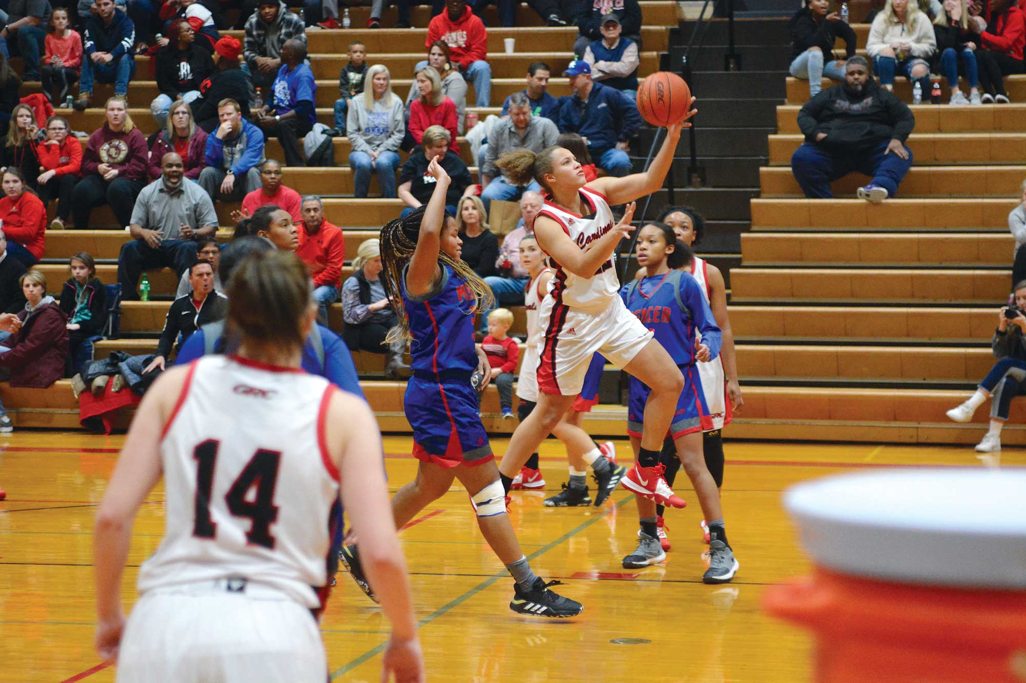 Boys, girls basketball teams win handily in first game of the season ...