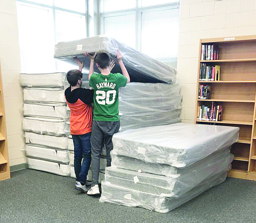 Changing the community one bed at a time: GRC freshmen partner to ...