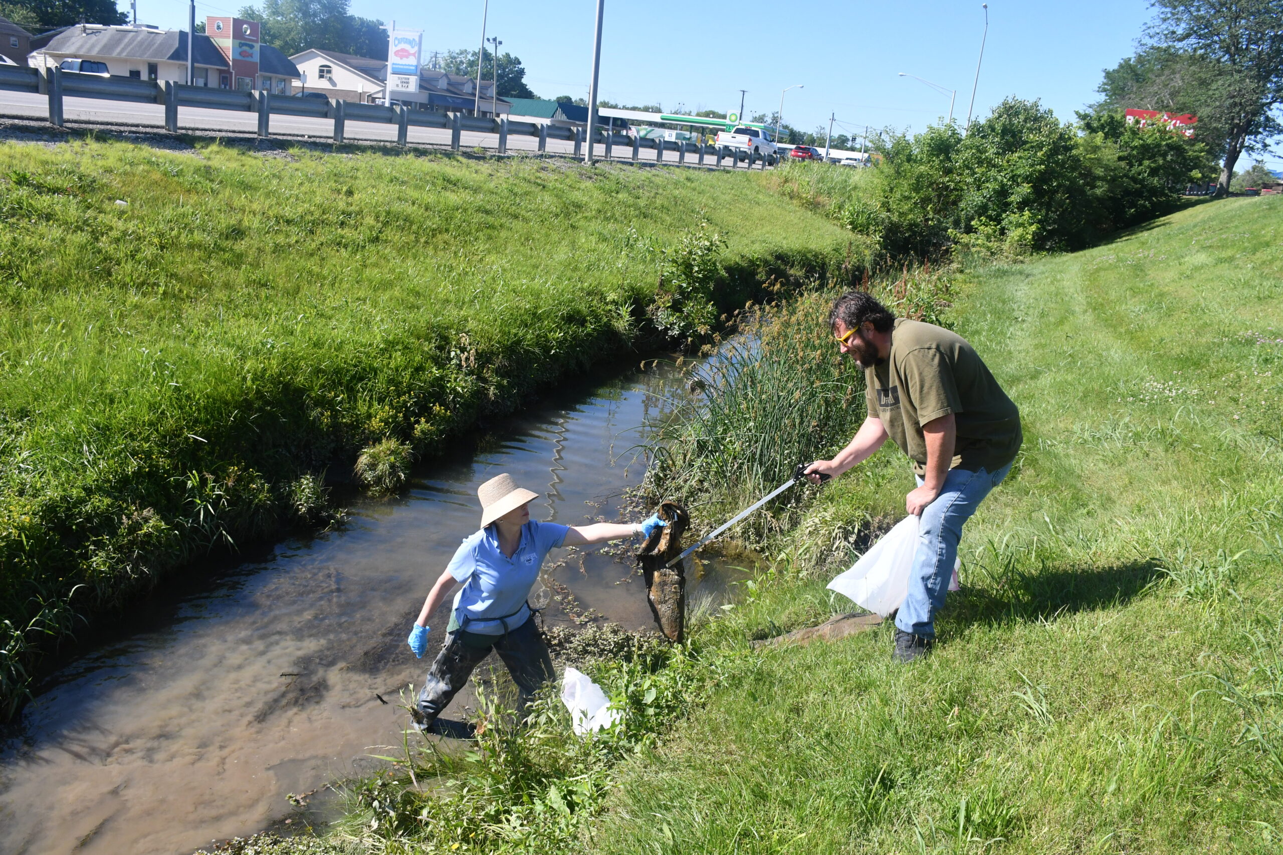 Stream clean-up succeeds at new location | Winchester Sun